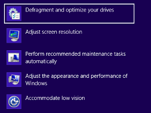 How do I use Disk Defragmenter to defragment my drive in Windows 8?